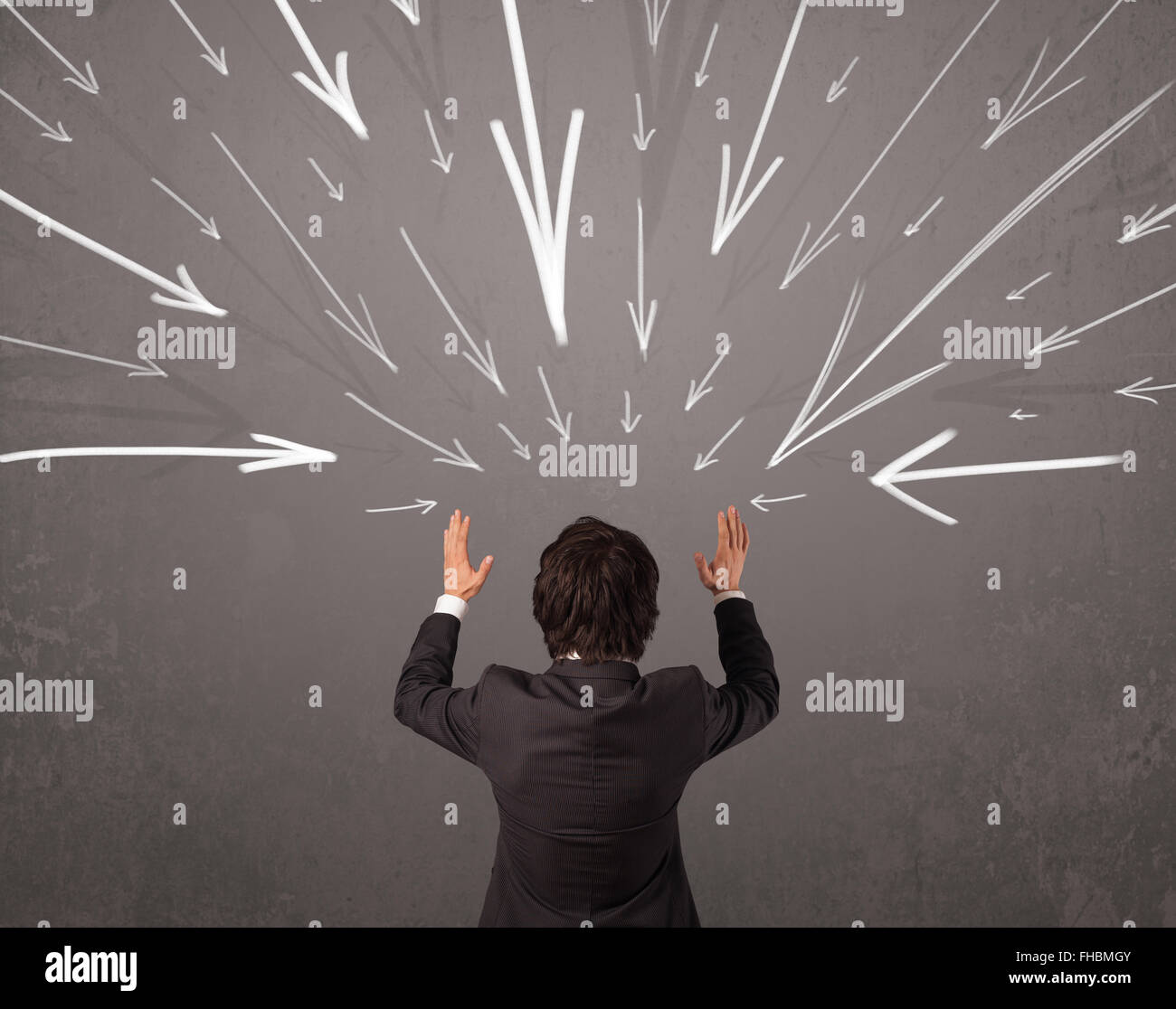 Business man with hand drawn arrows pointing at his head Stock Photo ...