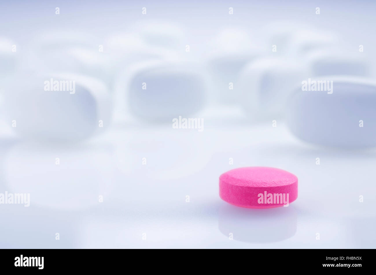 Medicine pink pill Stock Photo - Alamy
