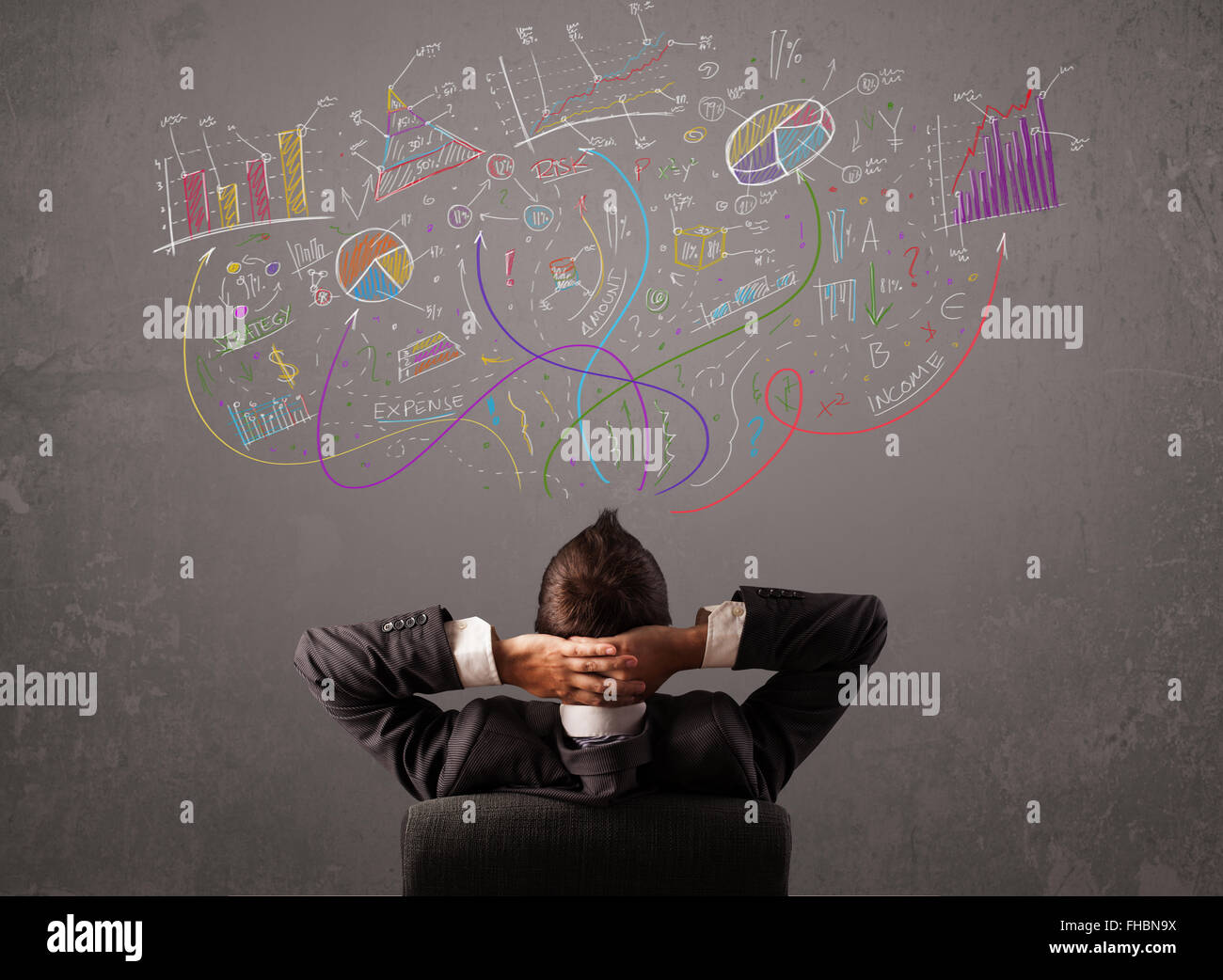 Young business man looking at sketches of graphs and symbols Stock ...