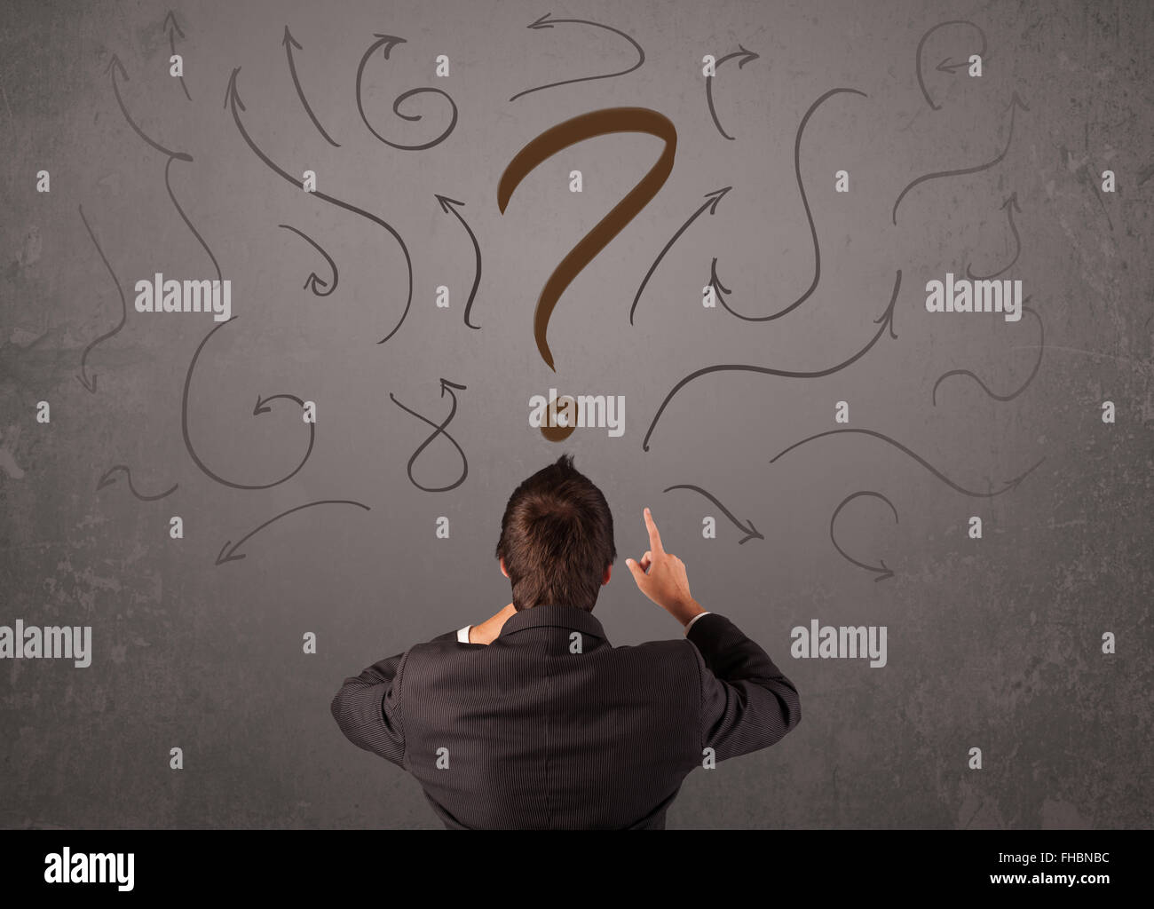Business man looking at question mark sketch Stock Photo - Alamy