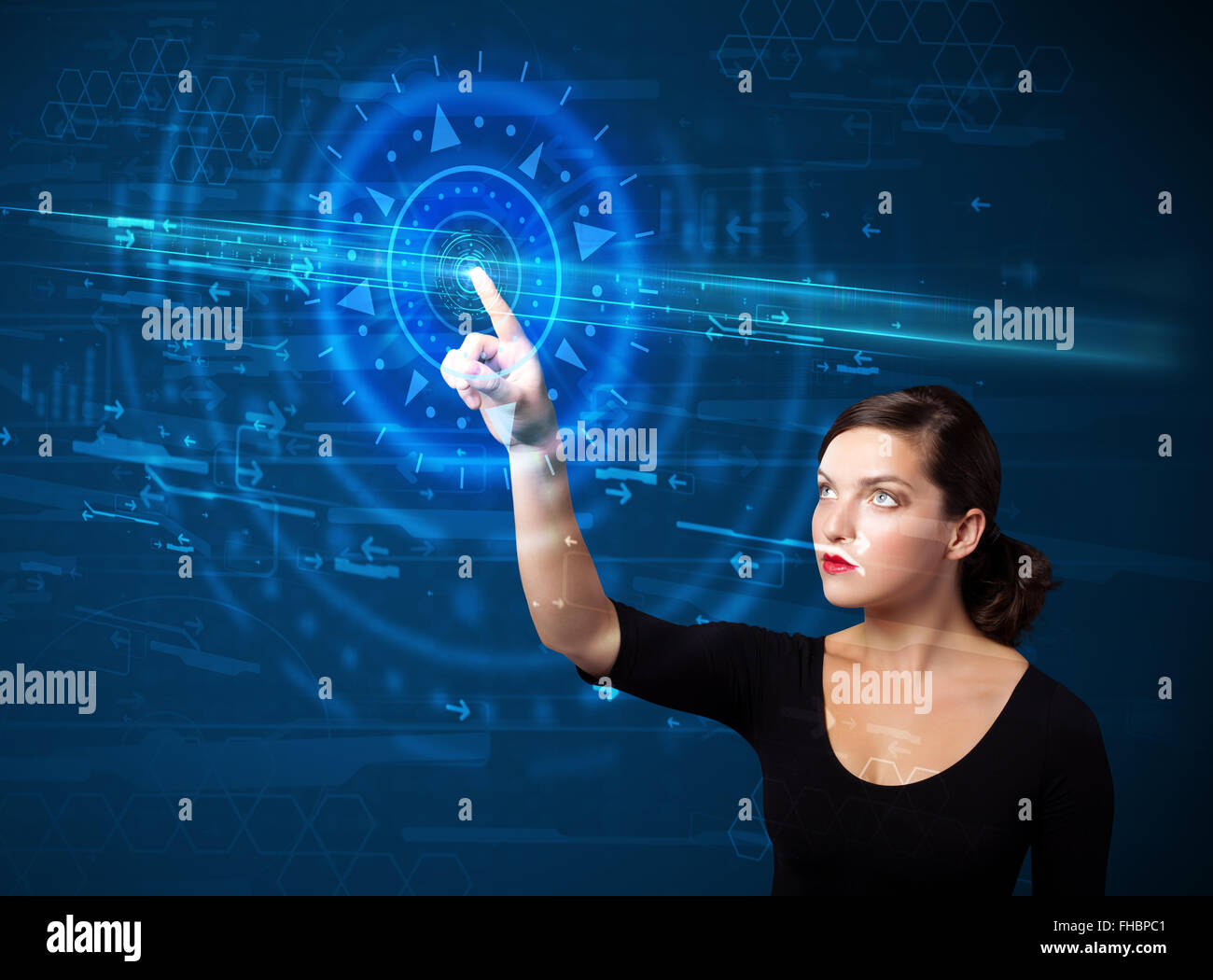 Young tech woman pressing high technology control panel screen concept ...