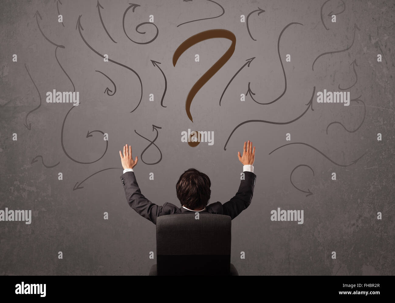Business man looking at question mark sketch Stock Photo - Alamy