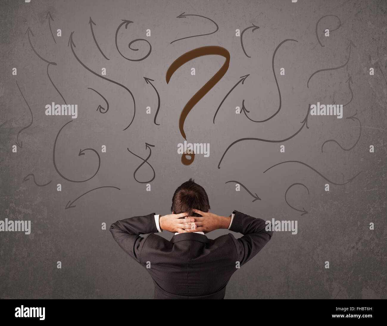 Business man looking at question mark sketch Stock Photo - Alamy