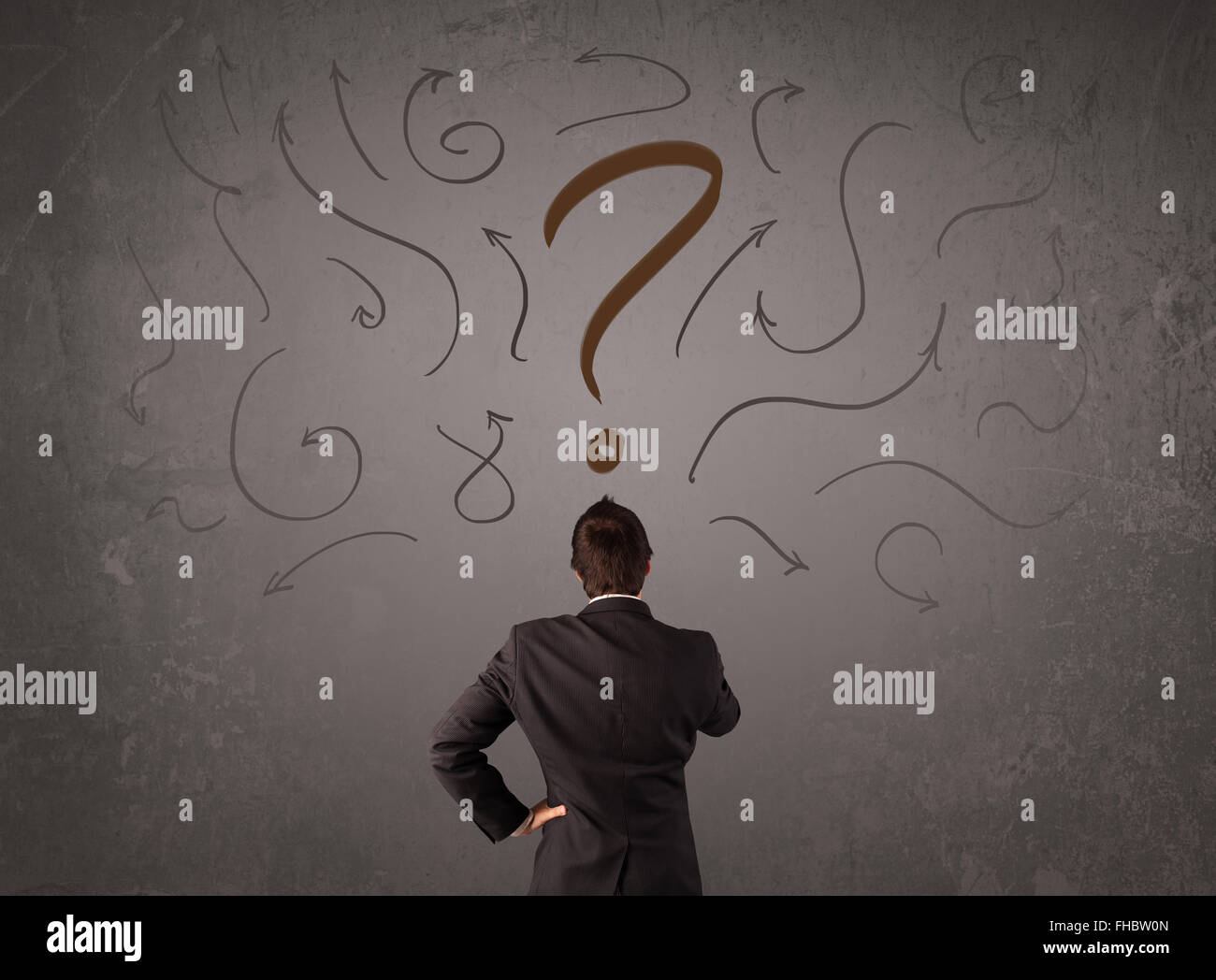 Business man looking at question mark sketch Stock Photo - Alamy