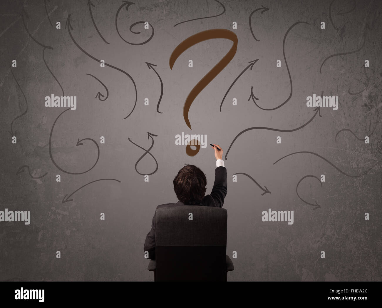 Business man looking at question mark sketch Stock Photo - Alamy