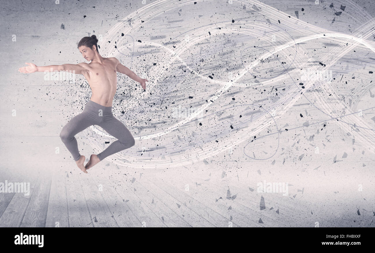 Performance ballet dancer jumping with energy explosion particles Stock ...
