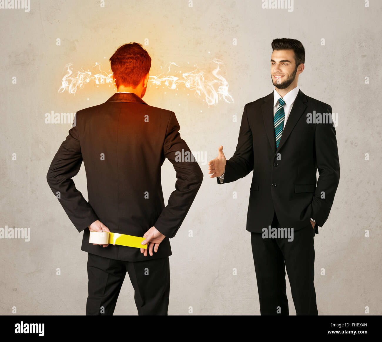 Angry businessman with weapon Stock Photo - Alamy