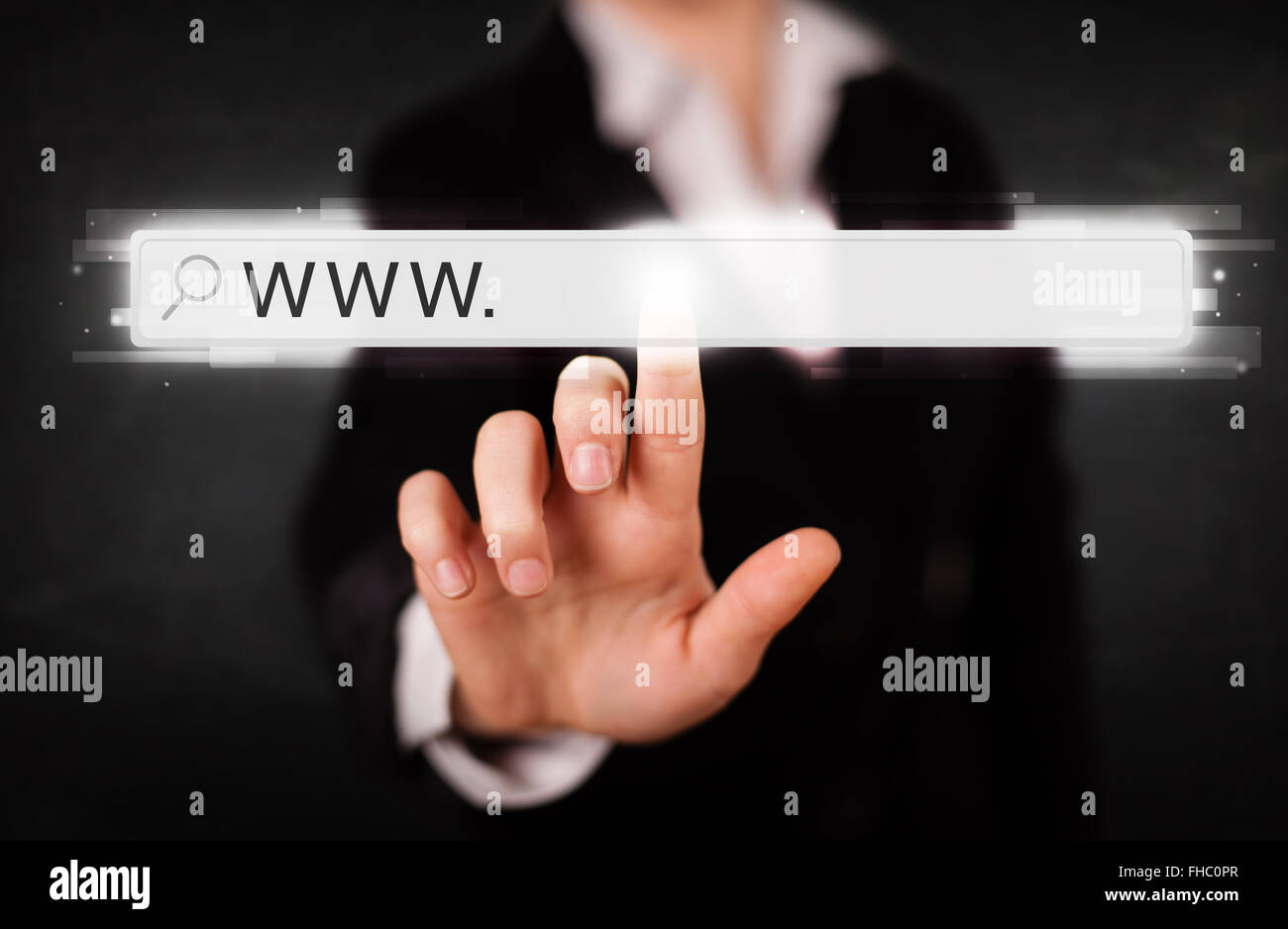 Young businesswoman touching web browser address bar with www sign ...