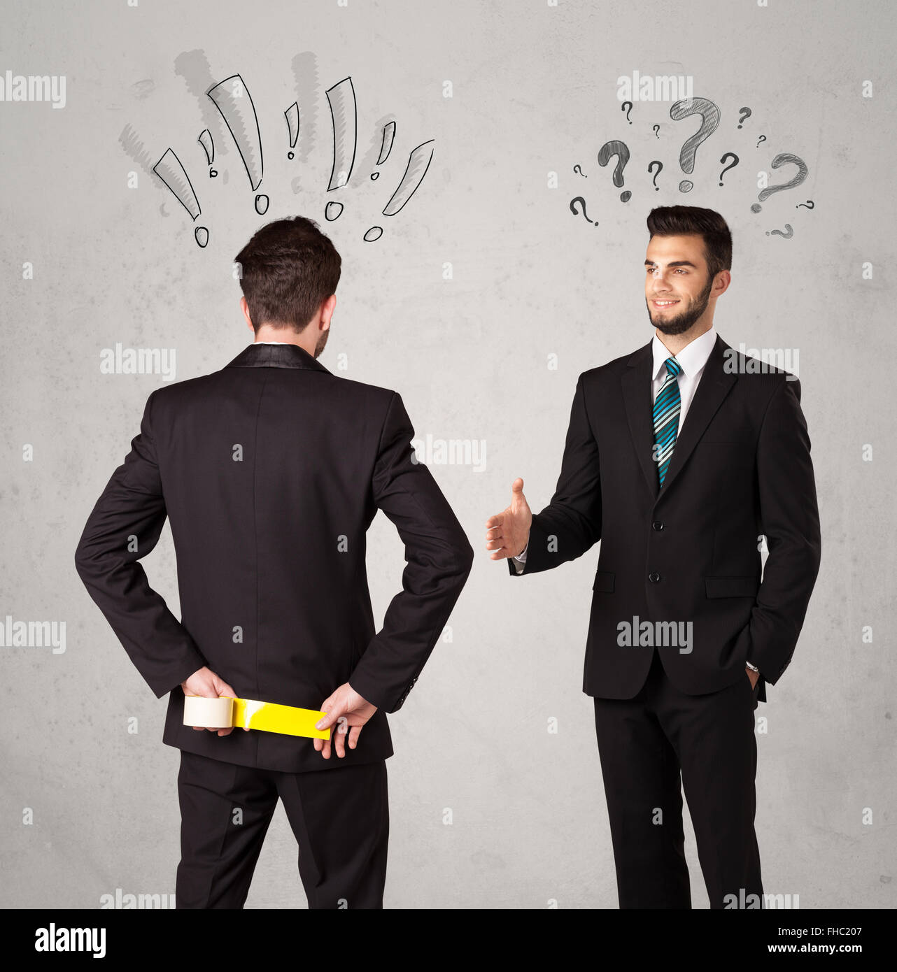 Ruthless business handshake Stock Photo - Alamy