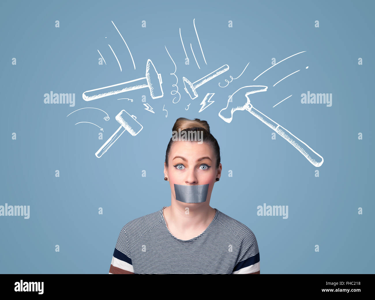 Young woman with glued mouth and hammer marks Stock Photo - Alamy