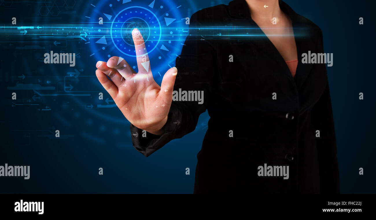 Young tech woman pressing high technology control panel screen concept ...