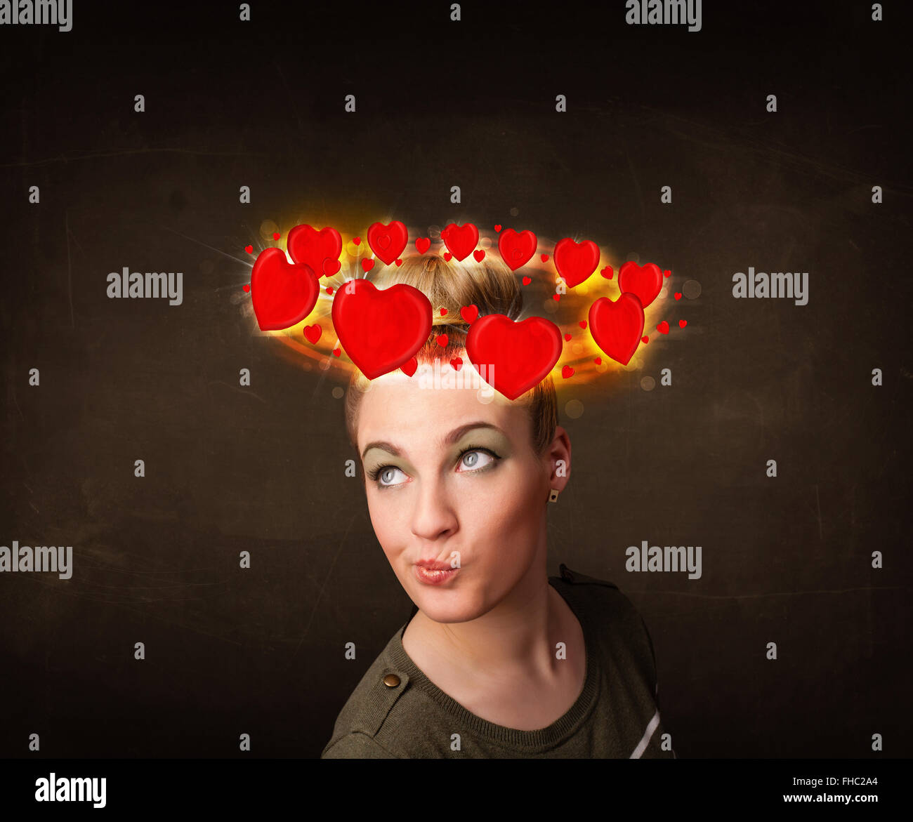 teenager girl with heart illustrations circleing around her head Stock ...