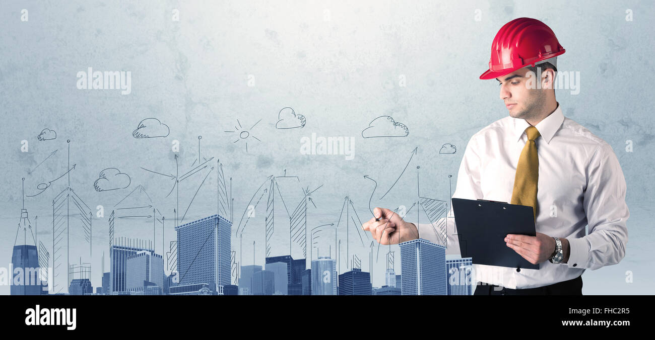 Young worker drawing a city sight Stock Photo - Alamy