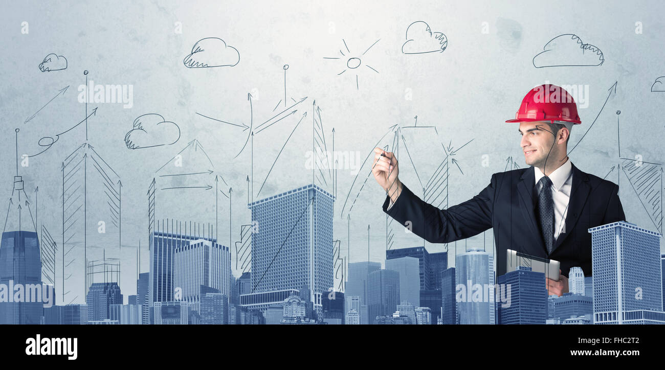 Young worker drawing a city sight Stock Photo - Alamy