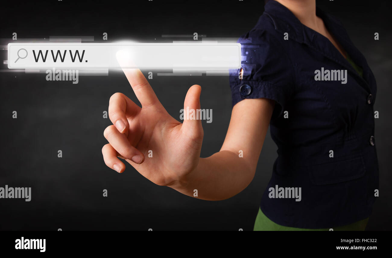 Young businesswoman touching web browser address bar with www sign ...