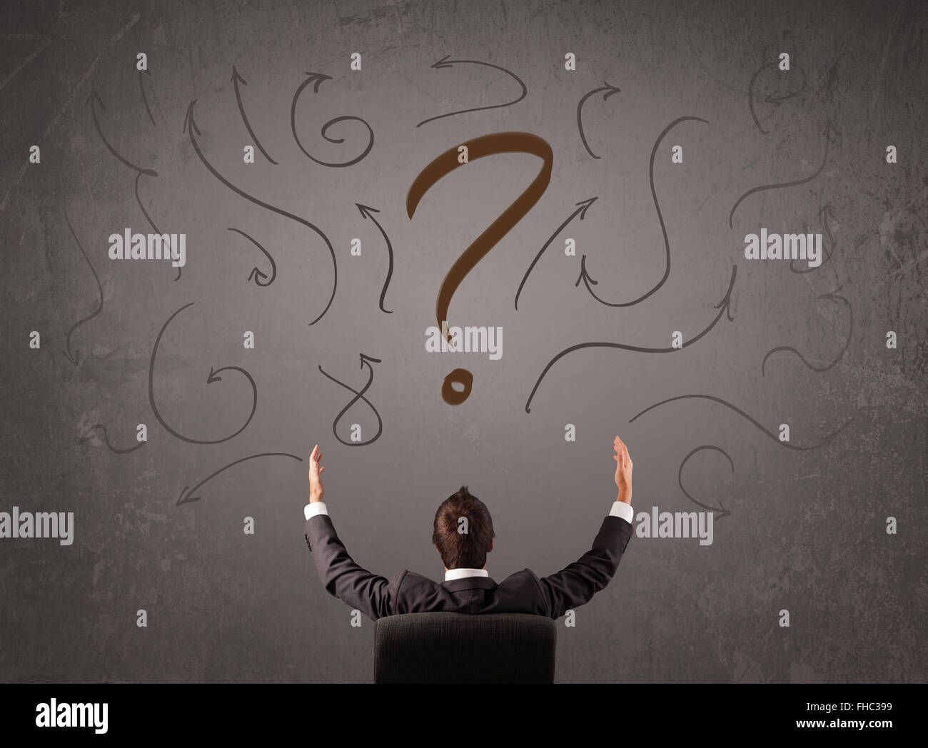 Business man looking at question mark sketch Stock Photo - Alamy