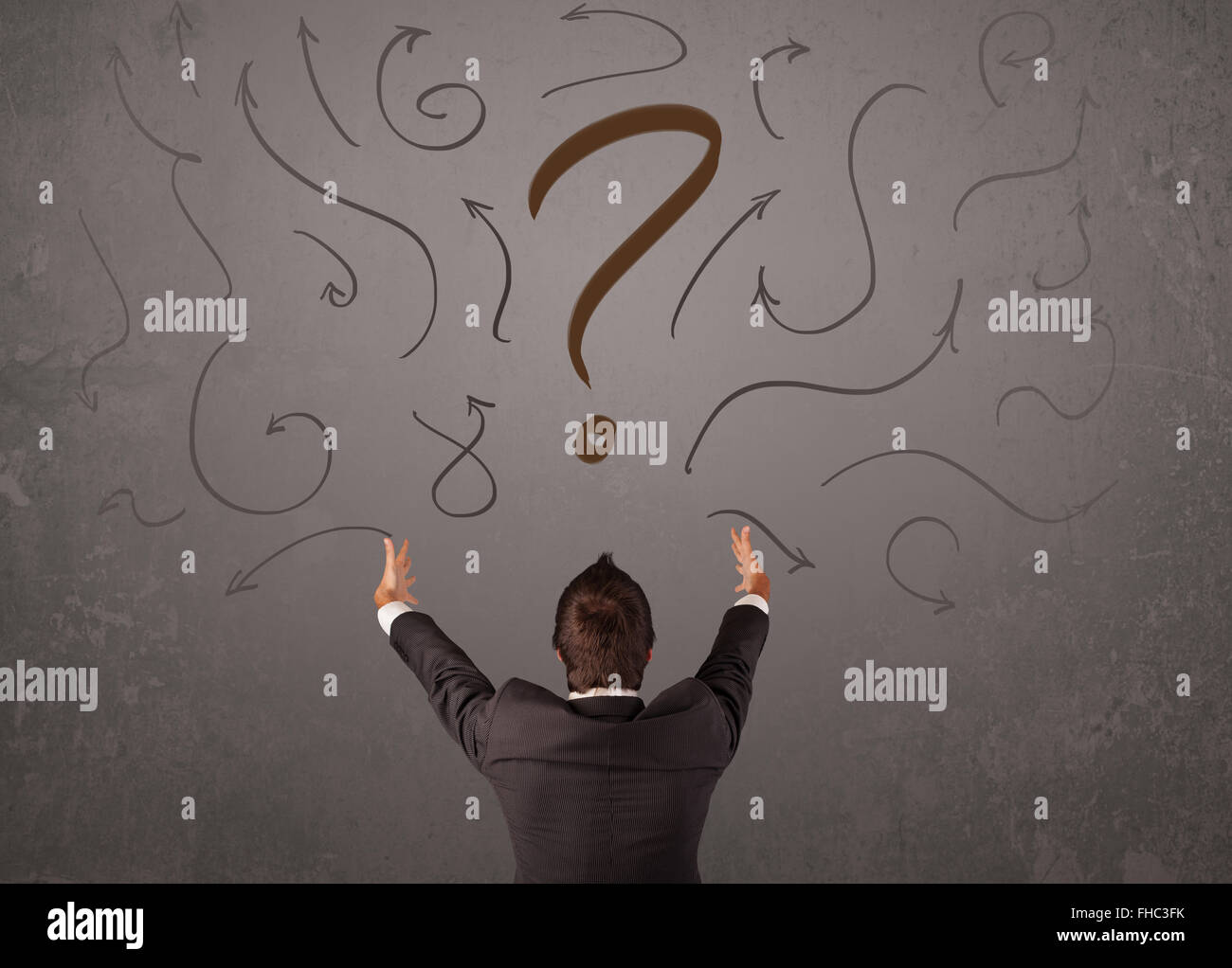 Business man looking at question mark sketch Stock Photo - Alamy