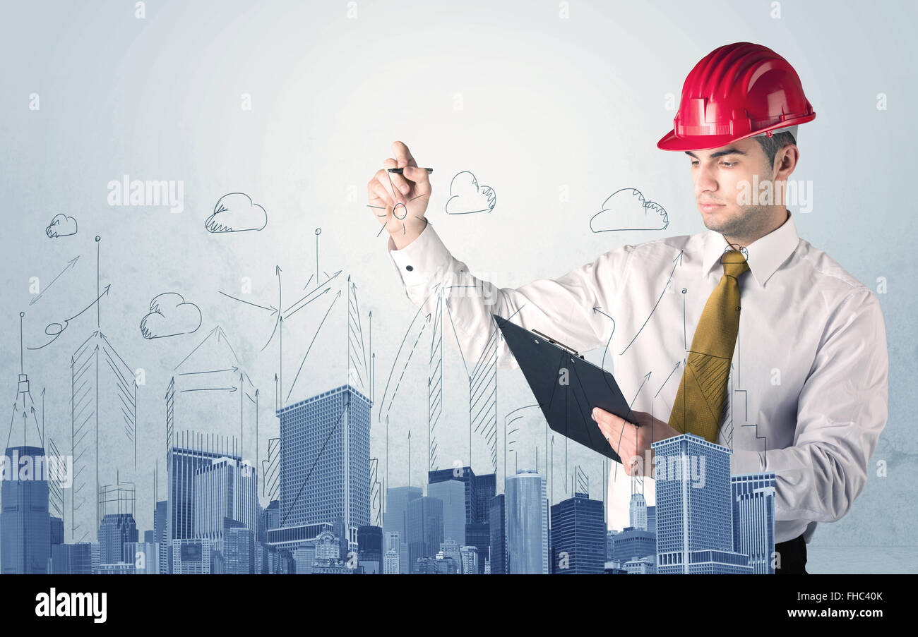 Young worker drawing a city sight Stock Photo - Alamy