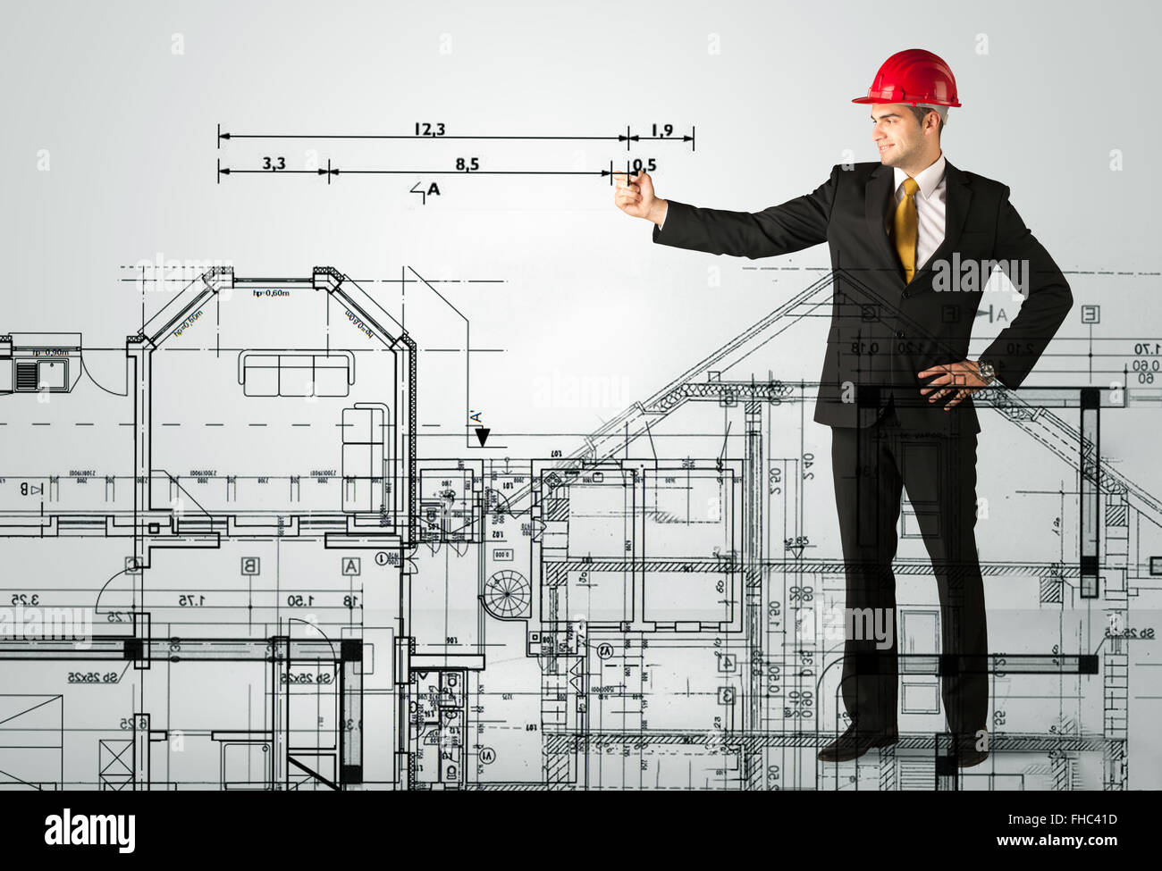 An young architect drawing a house plan Stock Photo - Alamy