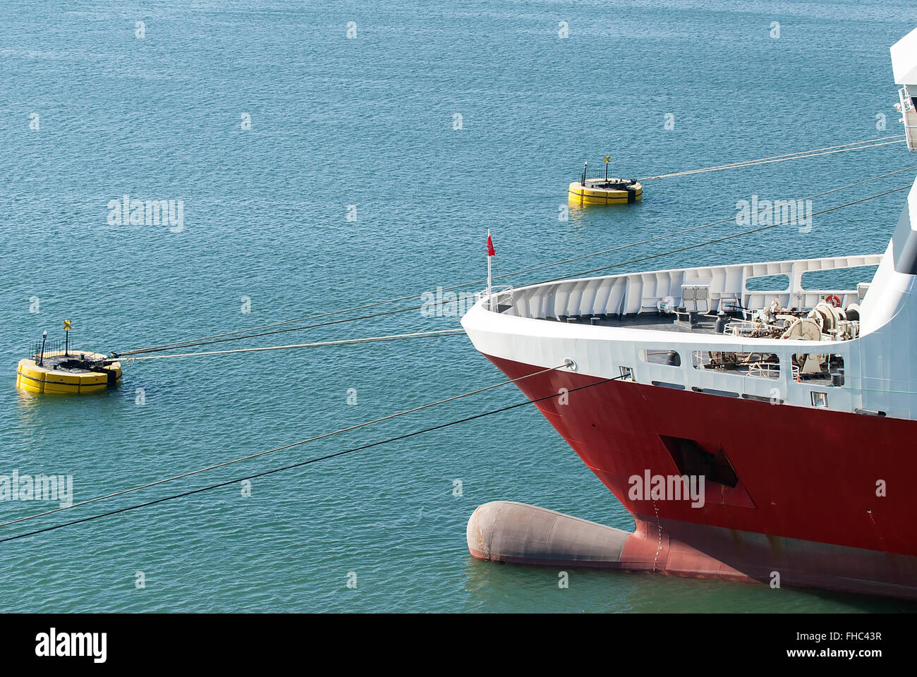 the bow of a container ship anchored to buoys Stock Photo - Alamy