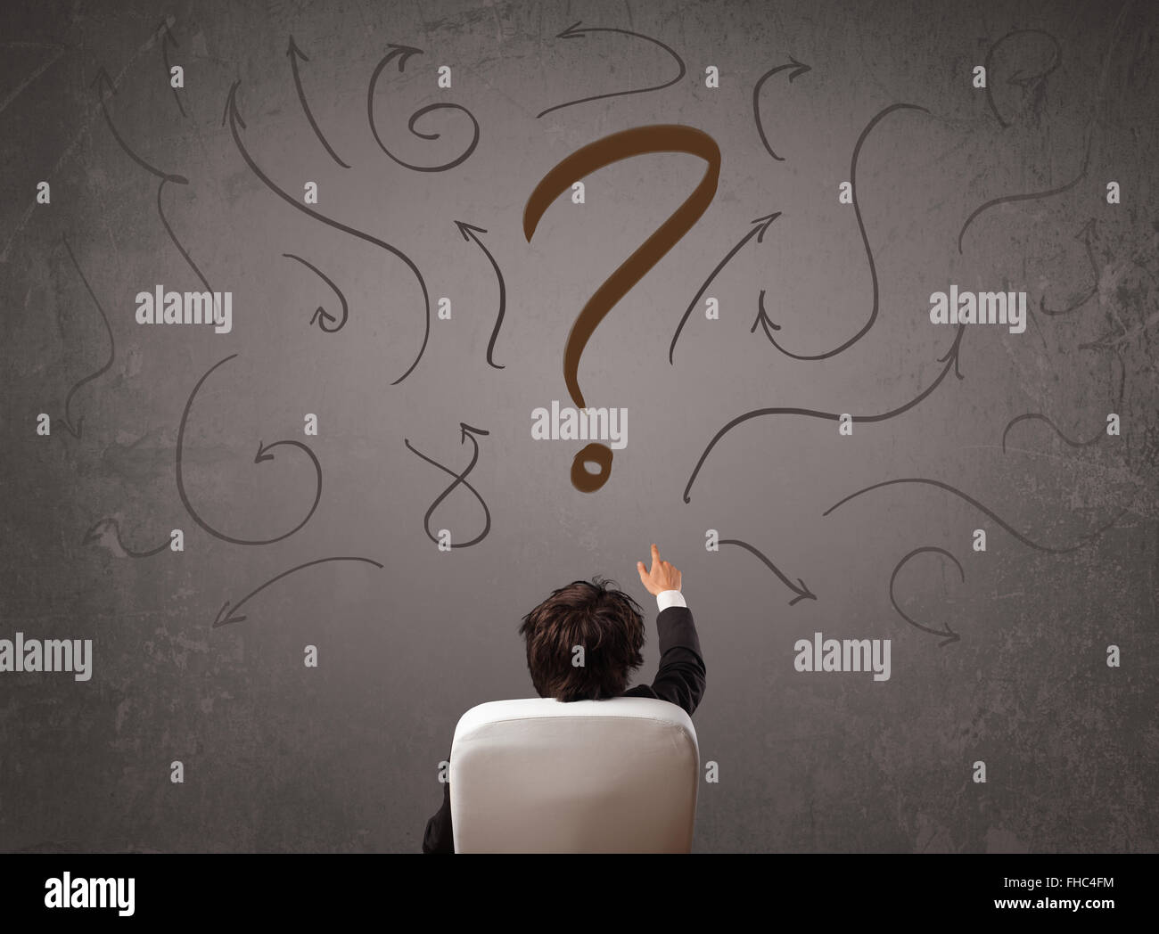 Business man looking at question mark sketch Stock Photo - Alamy