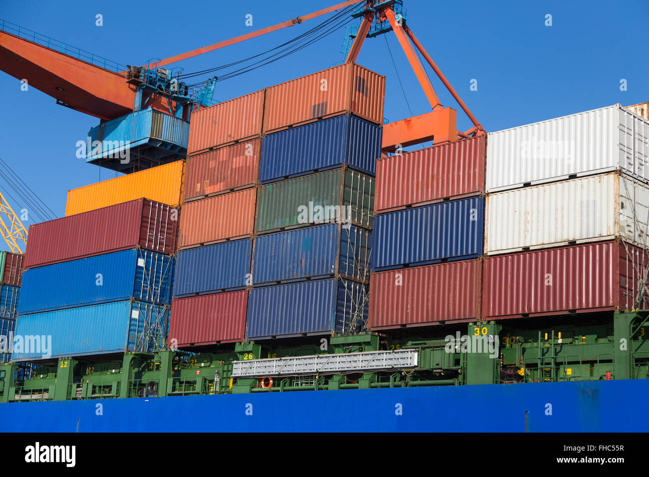 Container Ship is loading in a port Stock Photo - Alamy
