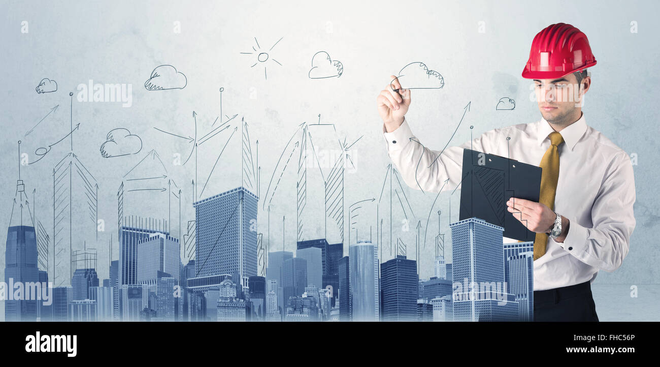 Young worker drawing a city sight Stock Photo - Alamy