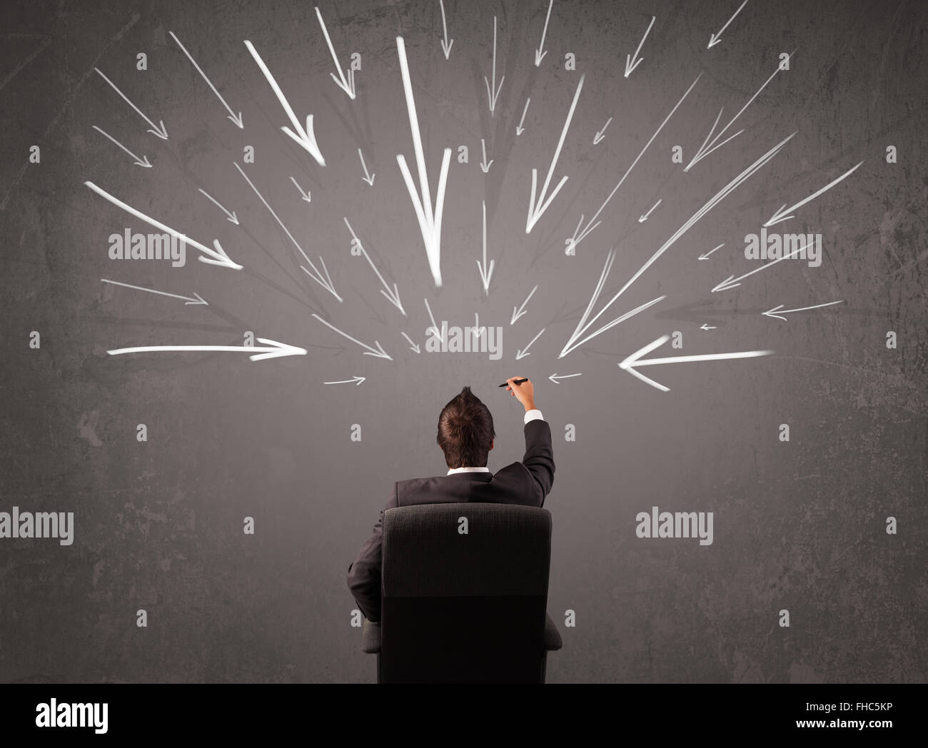 Business man with hand drawn arrows pointing at his head Stock Photo ...