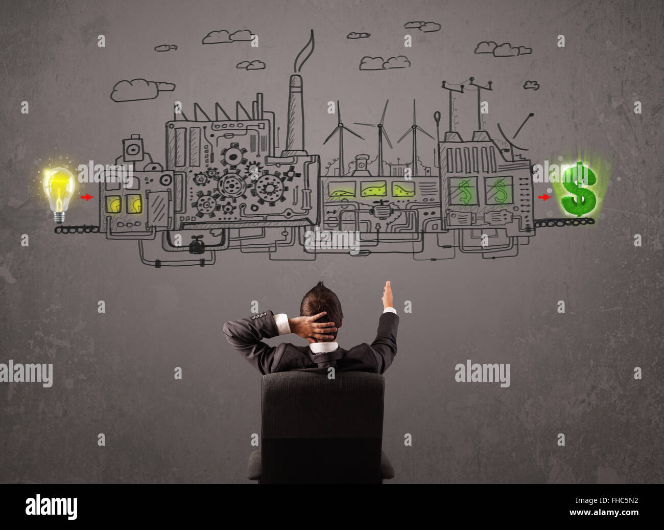 Business man looking at factory that makes money from ideas Stock Photo ...