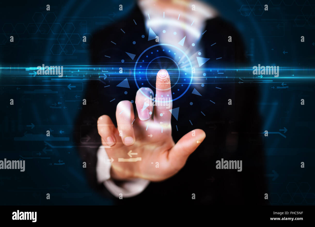 Handsome tech guy pressing high technology control panel screen concept ...