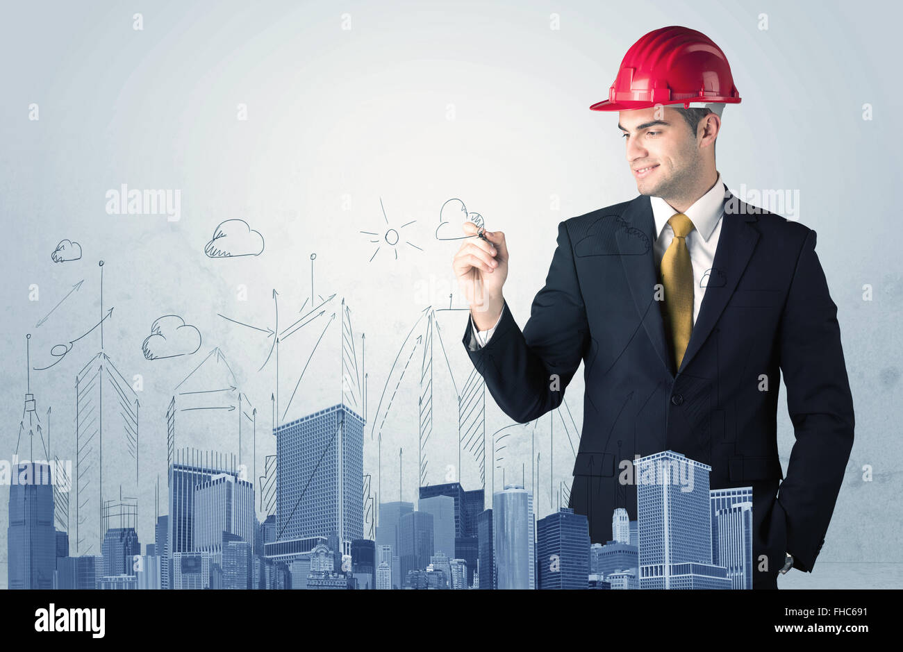 Young worker drawing a city sight Stock Photo - Alamy
