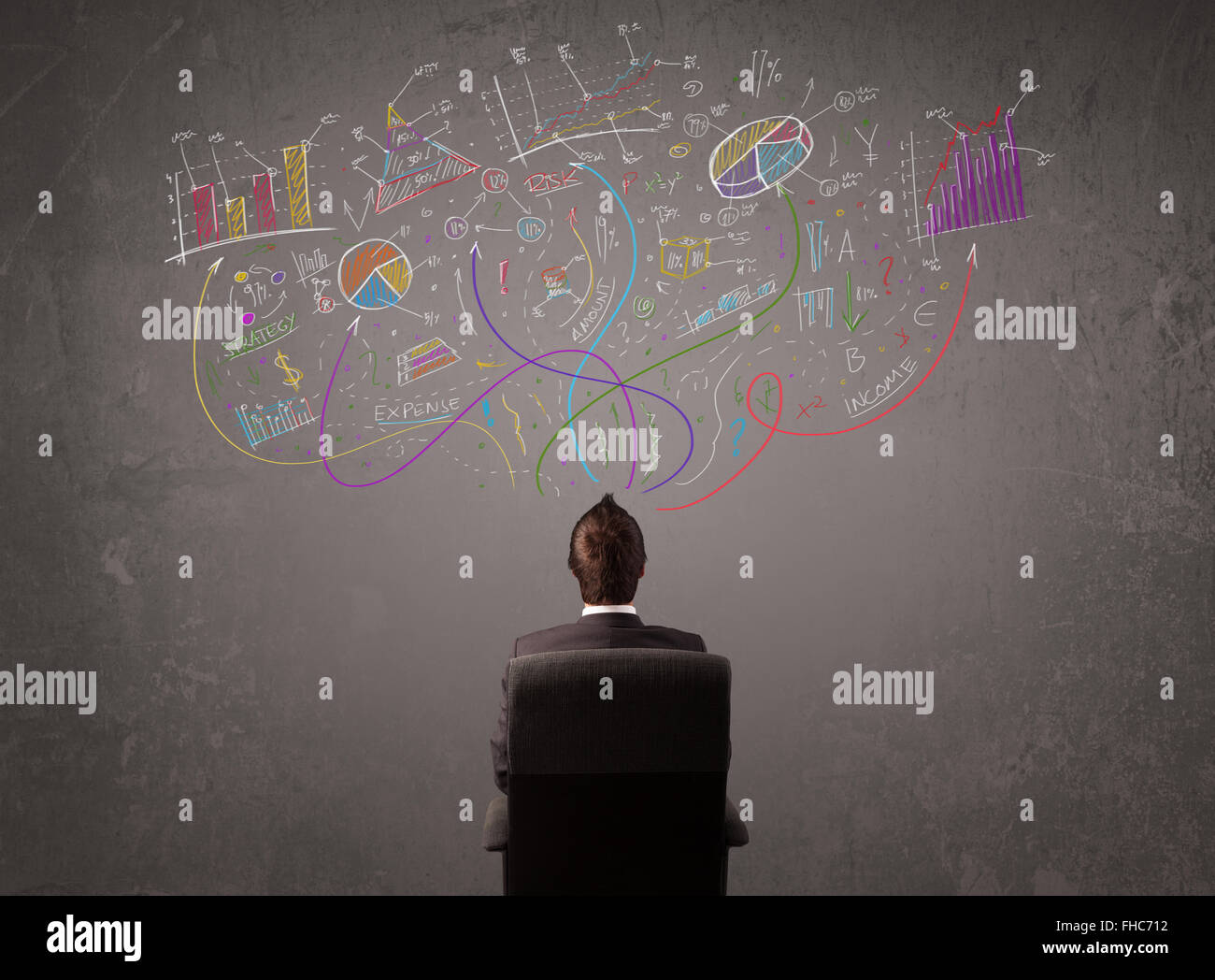 Young business man looking at sketches of graphs and symbols Stock ...
