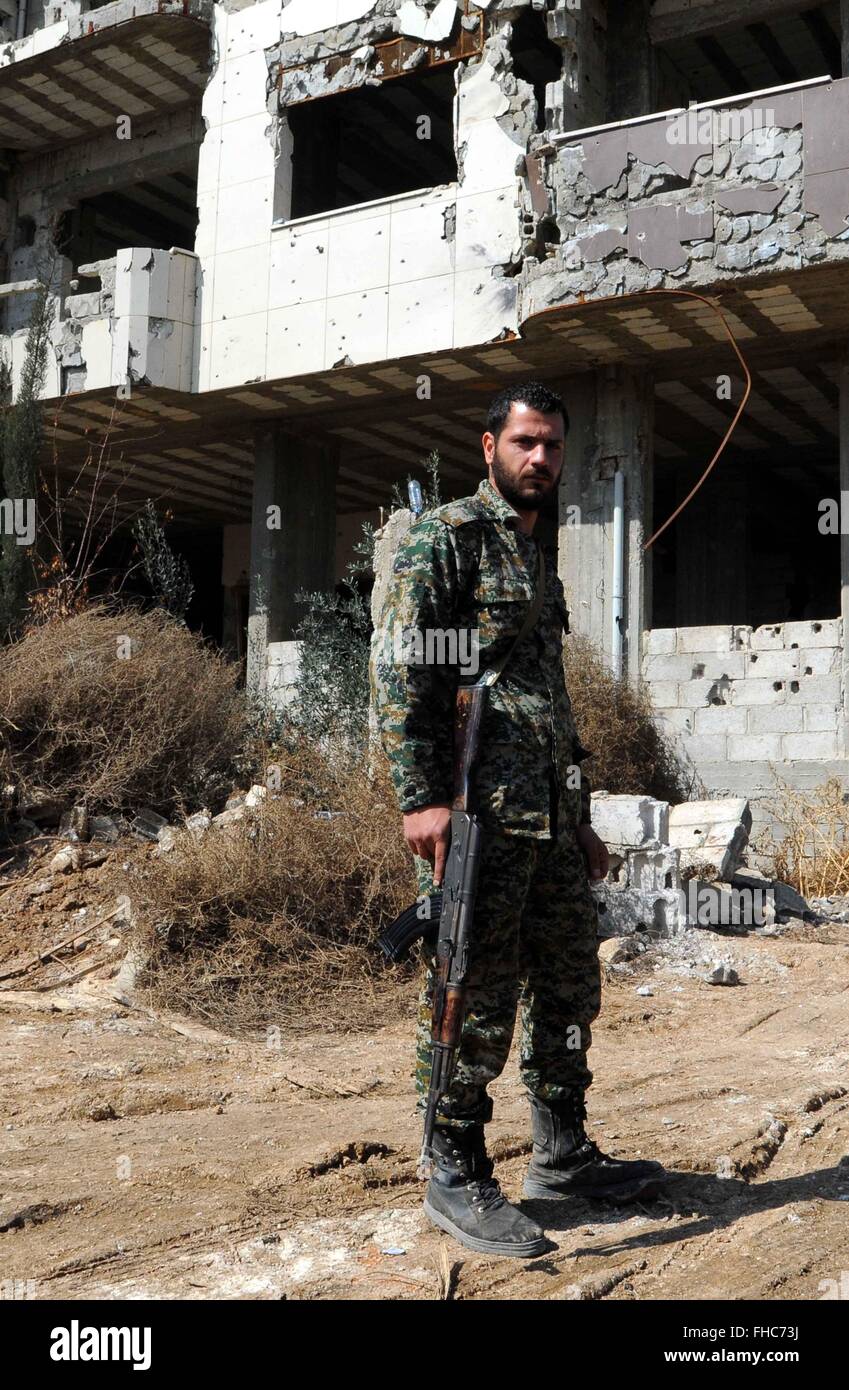 (160224) -- DARAYA, Feb. 24 (Xinhua) -- A Syrian soldier stands in ...