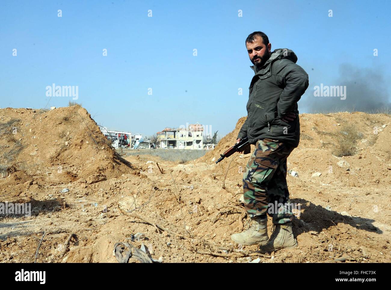 (160224) -- DARAYA, Feb. 24 (Xinhua) -- A Syrian soldier is seen in the ...