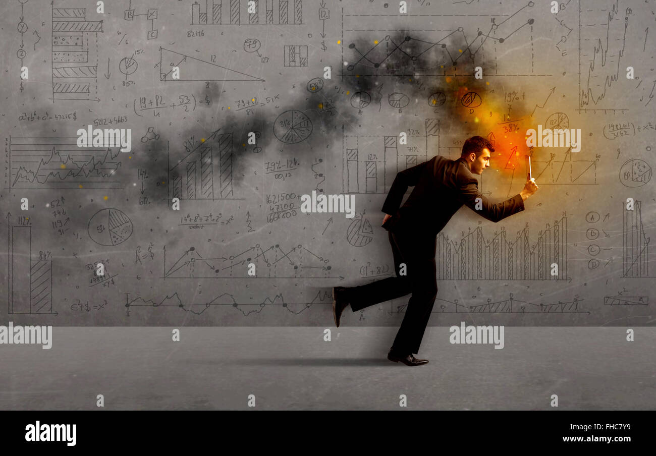 Running business man with fire laptop Stock Photo - Alamy