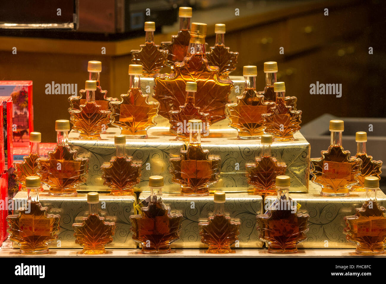 Bottles of Maple syrup in shop window in downtown Victoria at predawn ...