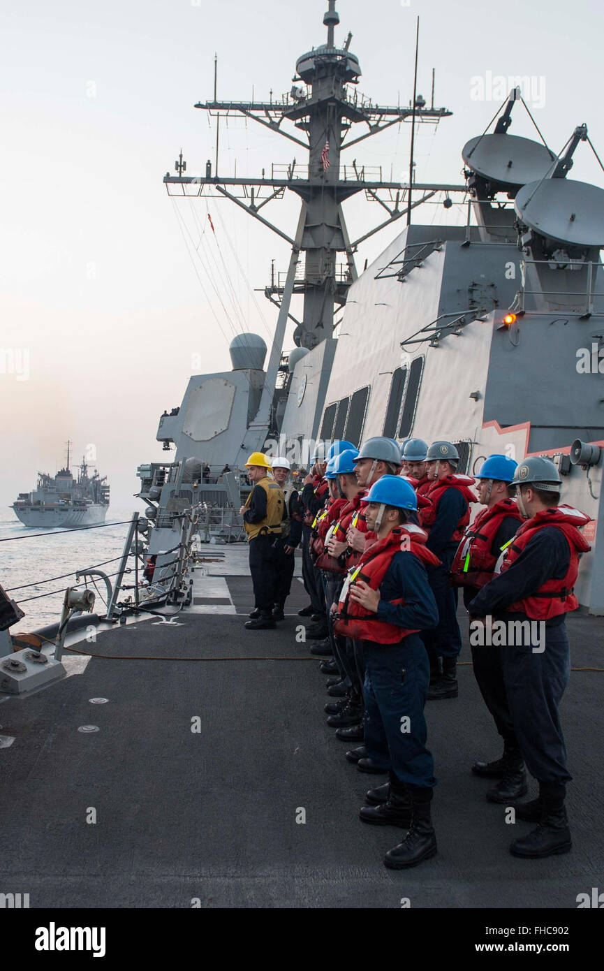 A US Navy ship, USS Farragut, during underway replenishment, part of ...