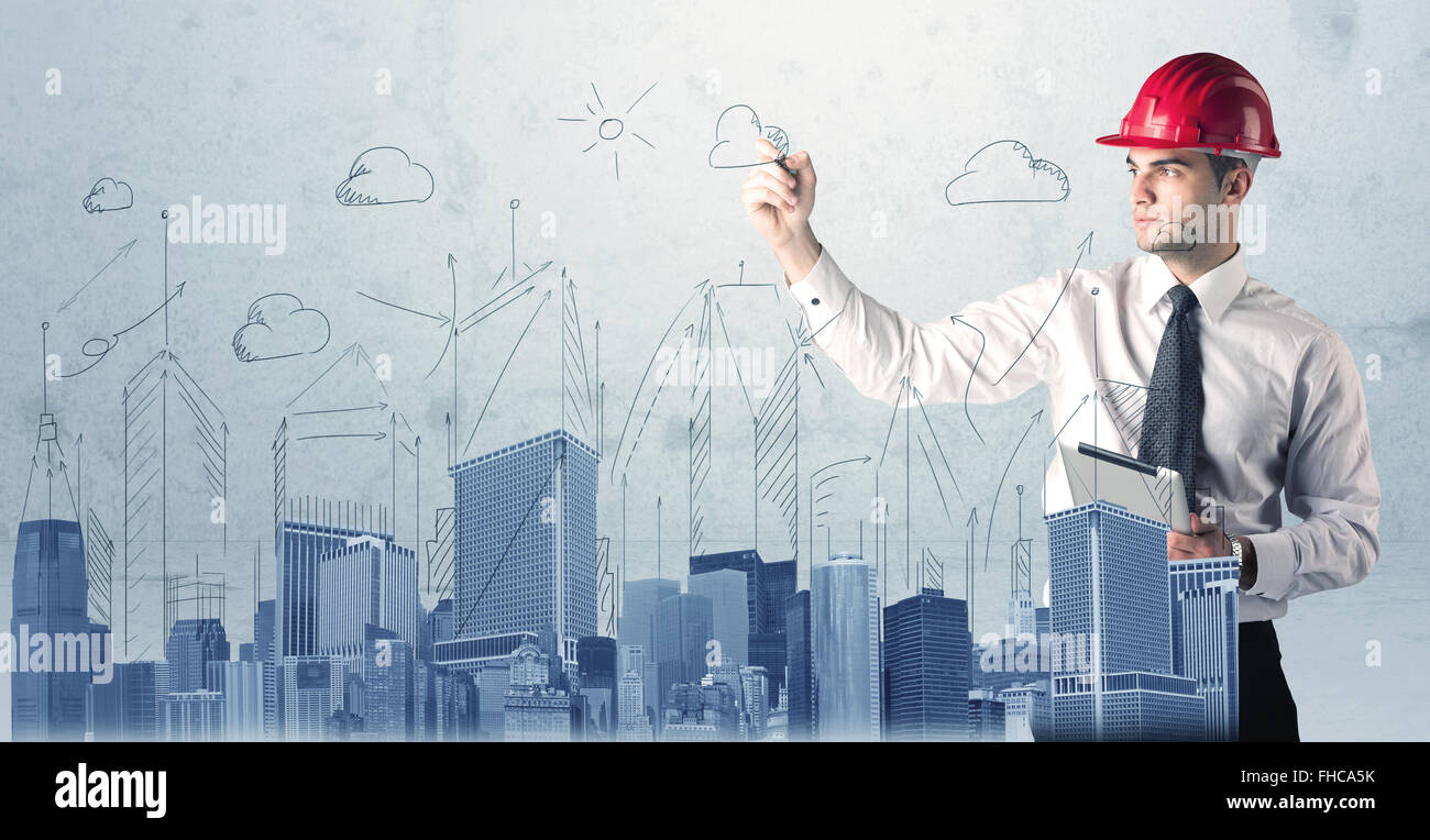 Young worker drawing a city sight Stock Photo - Alamy