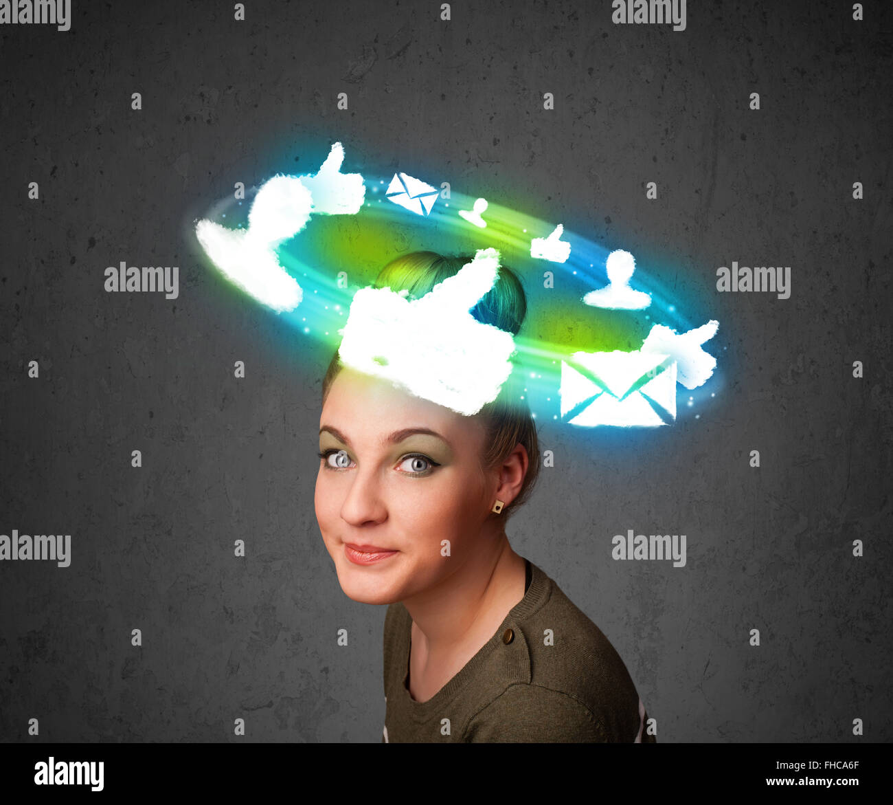 Young teenager with cloud social icons around her head Stock Photo - Alamy