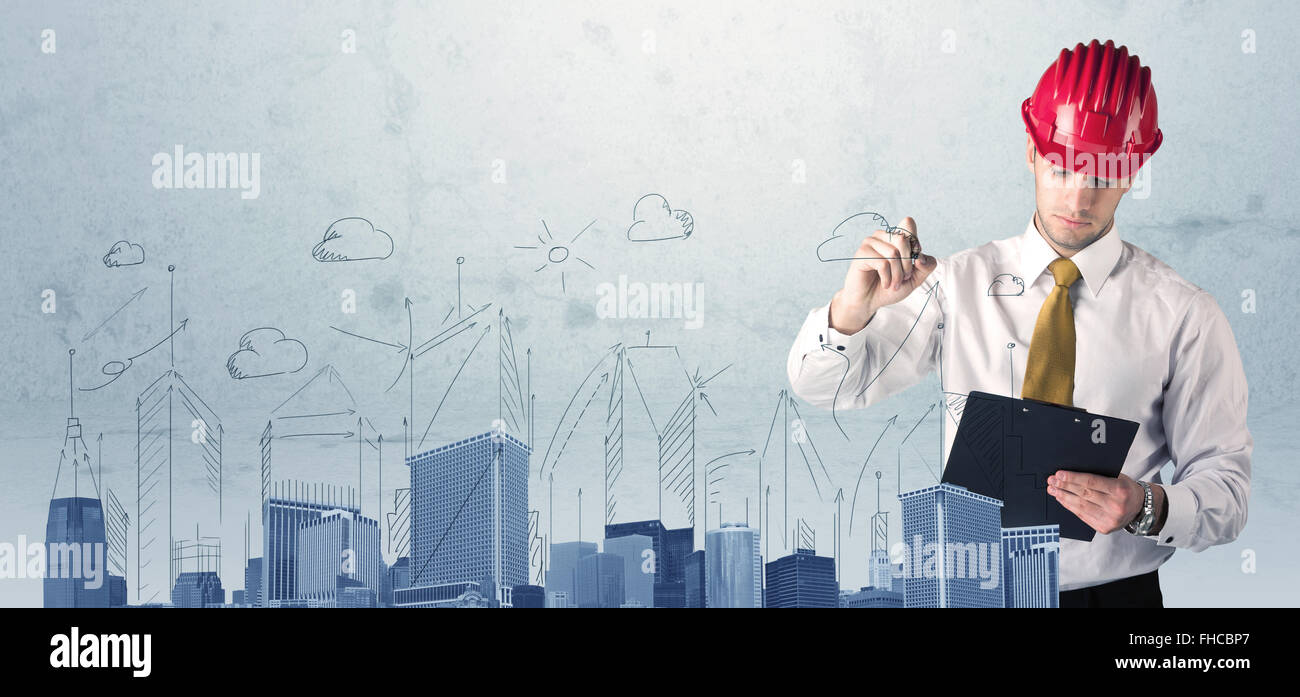 Young worker drawing a city sight Stock Photo - Alamy