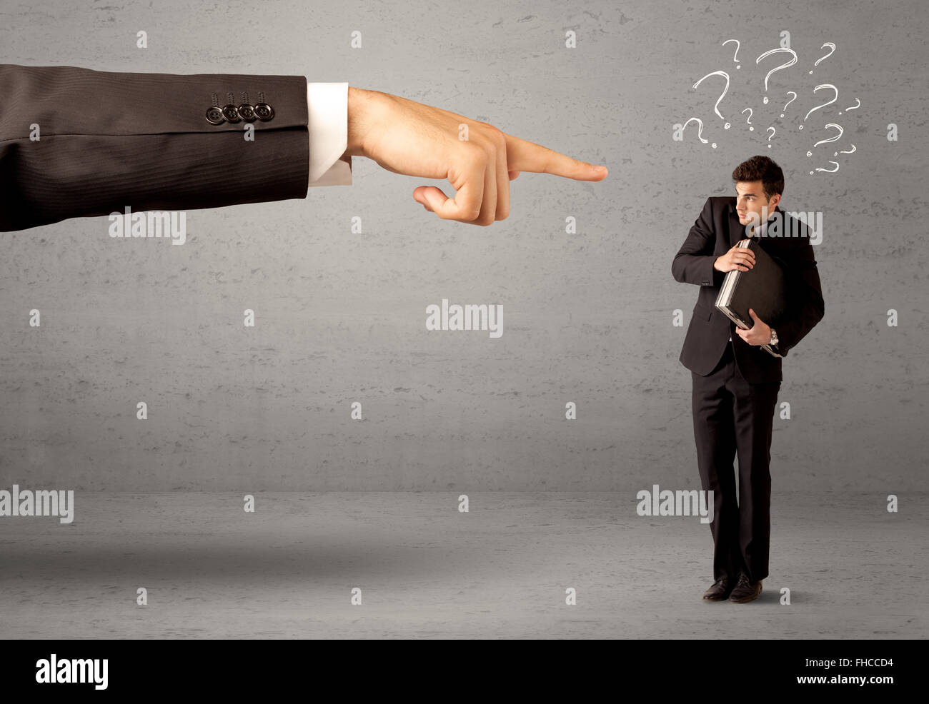 Confused employee getting order from boss Stock Photo - Alamy