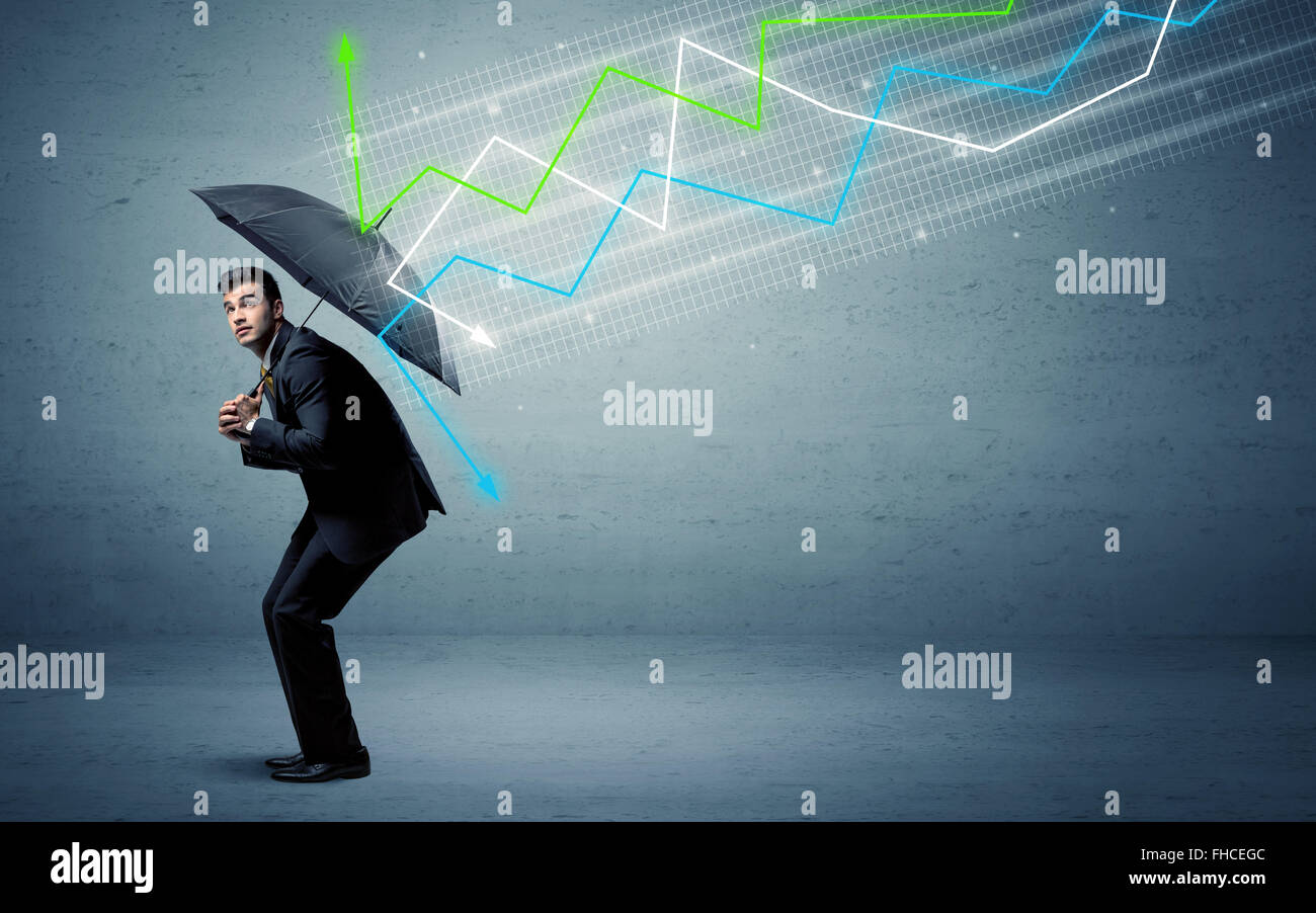 Business person with umbrella and stock market arrows concept Stock ...