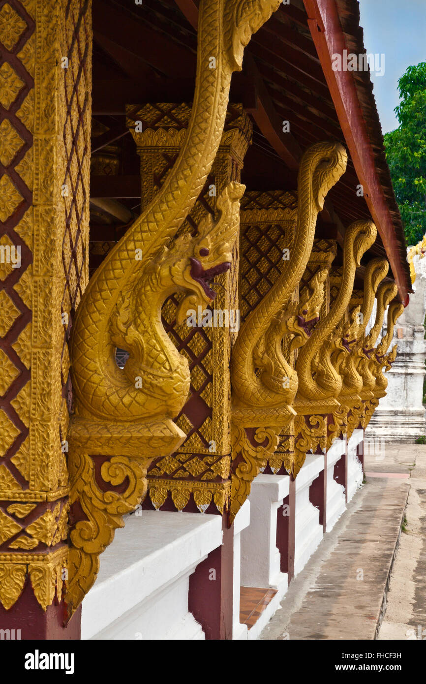 DRAGON STRUTS on a BUDDHIST TEMPLE - LUANG PRABANG, LAOS Stock Photo ...