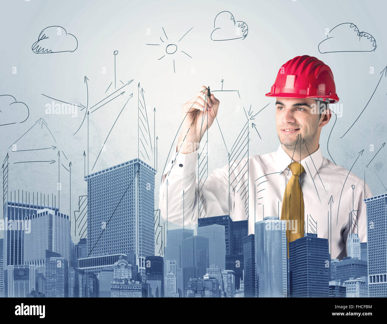 Young worker drawing a city sight Stock Photo - Alamy