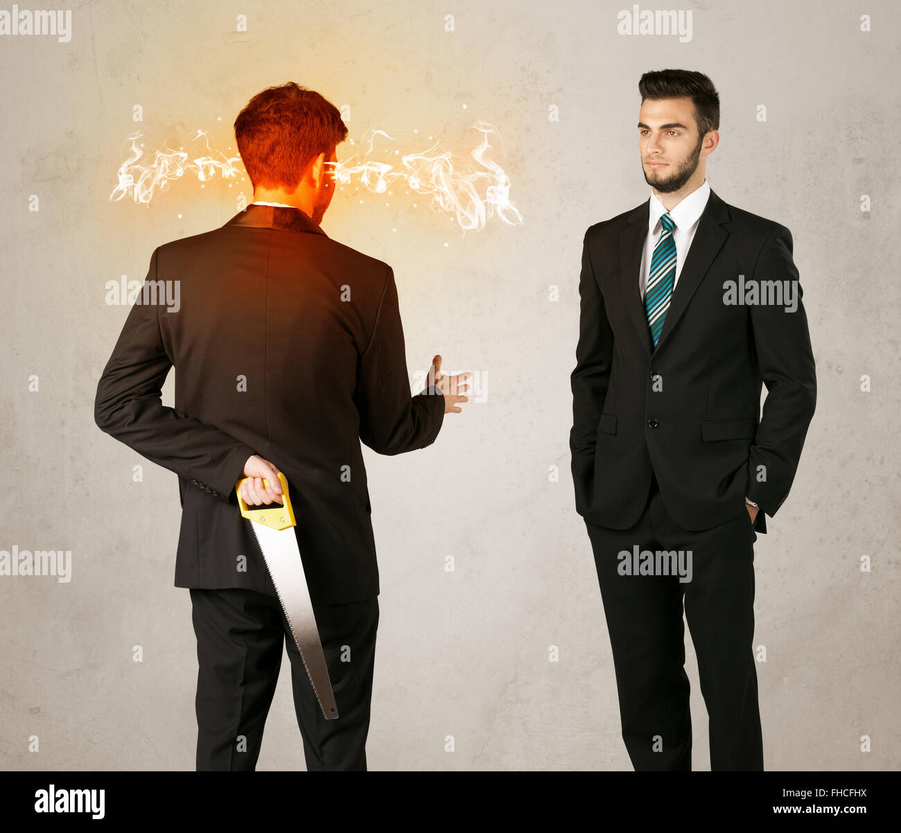 Angry businessman with weapon Stock Photo - Alamy