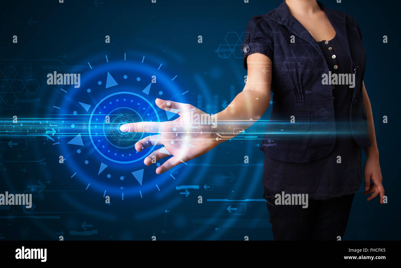 Young tech woman pressing high technology control panel screen concept ...