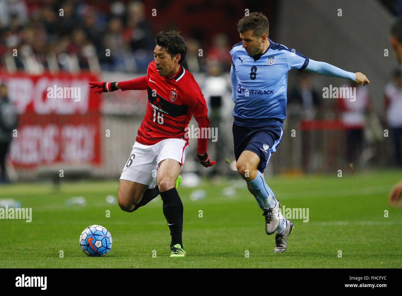 Saitama, Japan. 24th Feb, 2016. (L-R) Takuya Aoki (Reds), Milos ...