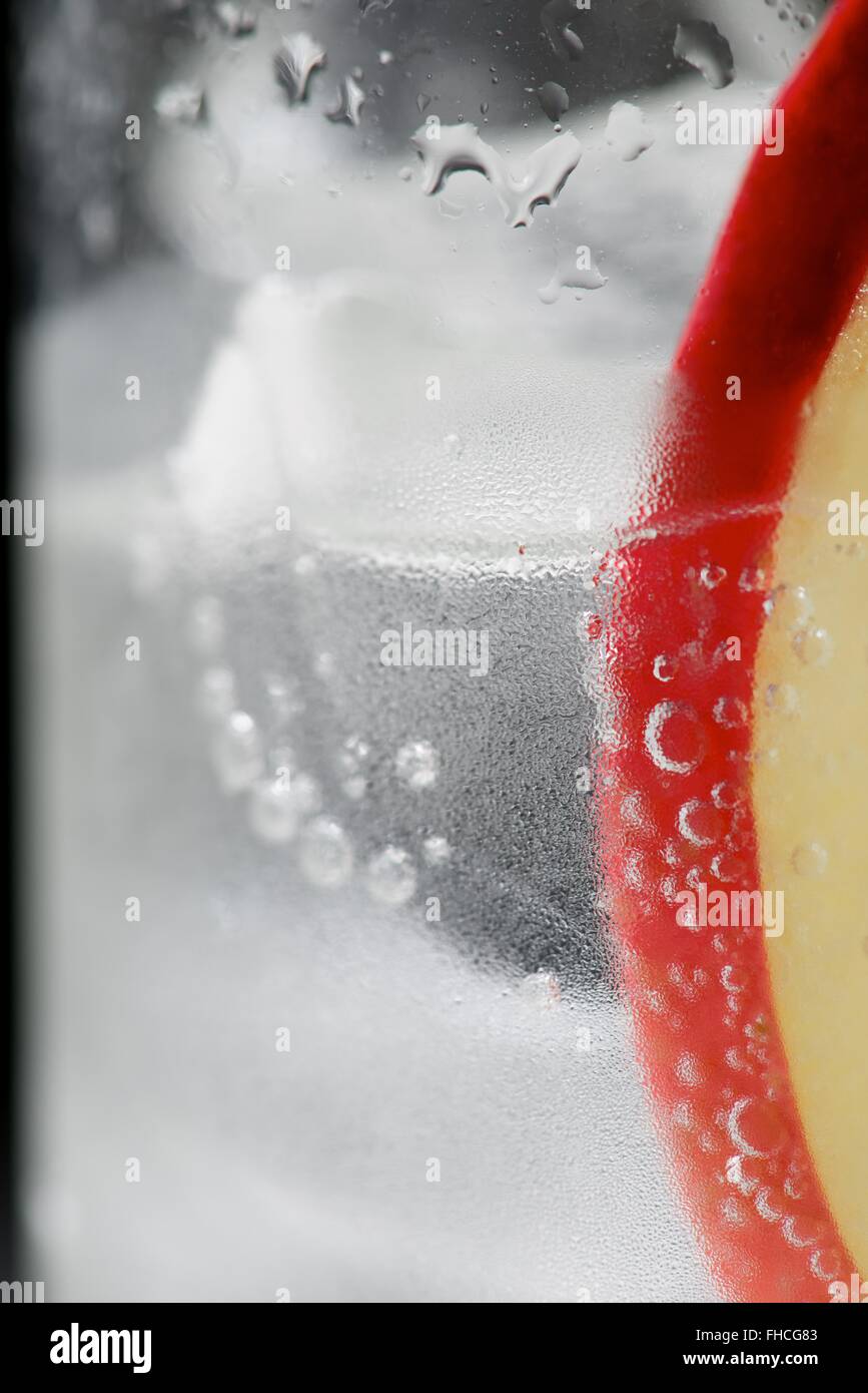 Apple gin tonic served in glass Stock Photo - Alamy