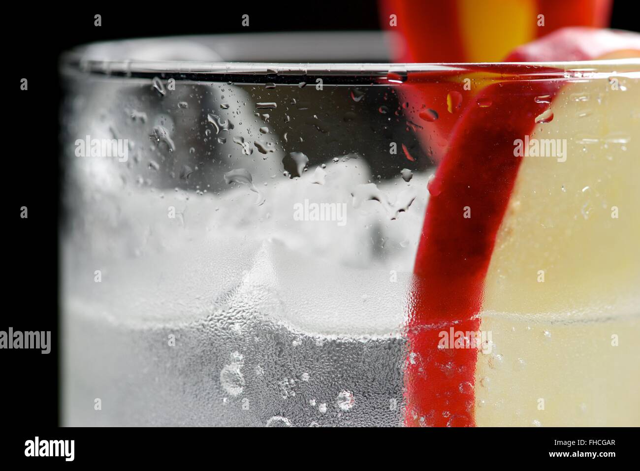 Apple gin tonic served in glass Stock Photo - Alamy