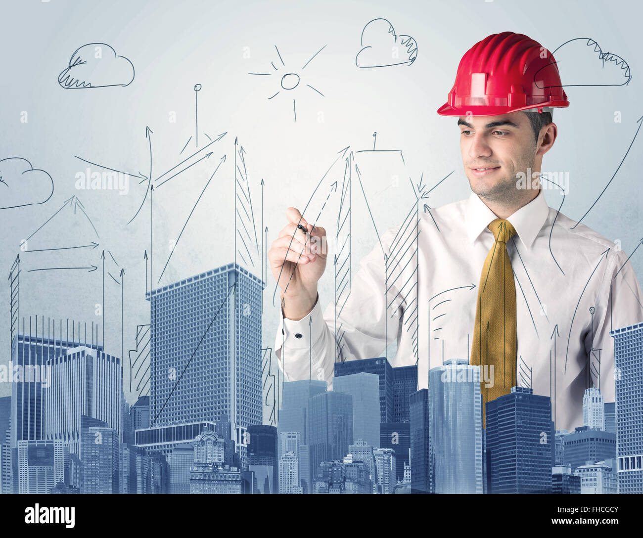 Young worker drawing a city sight Stock Photo - Alamy